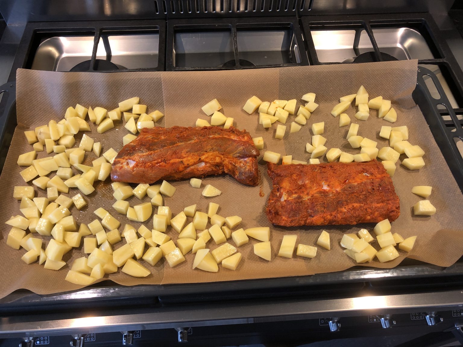Ribbetjes met aardappelen in de oven - Greet's Keuken